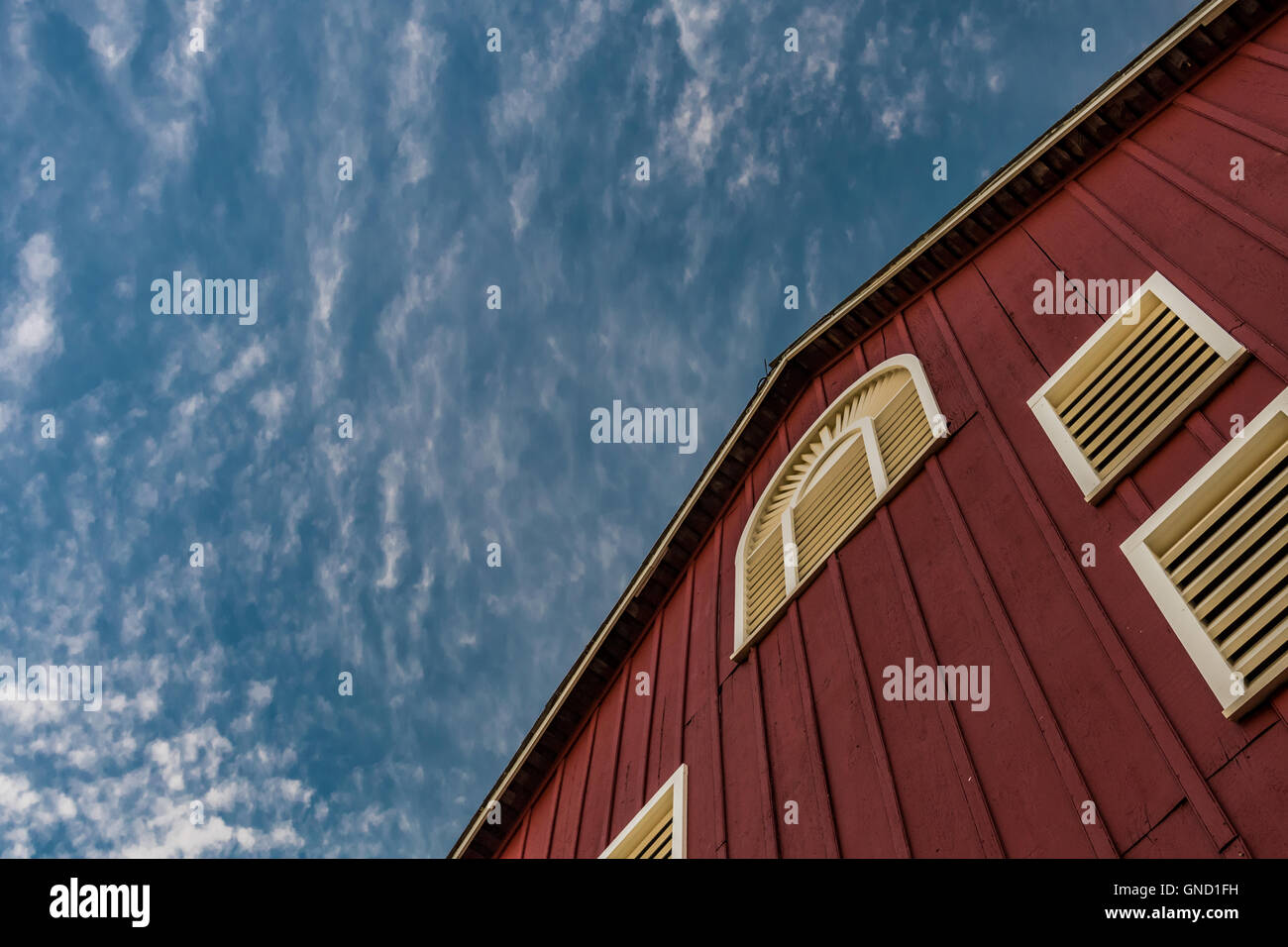 Looking Up at Red Barn and Sky with copy space Stock Photo - Alamy