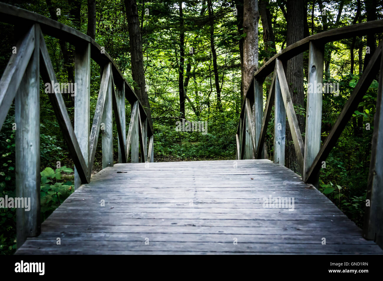 Over the bridge and far away. Ground level view over a bridge and into ...