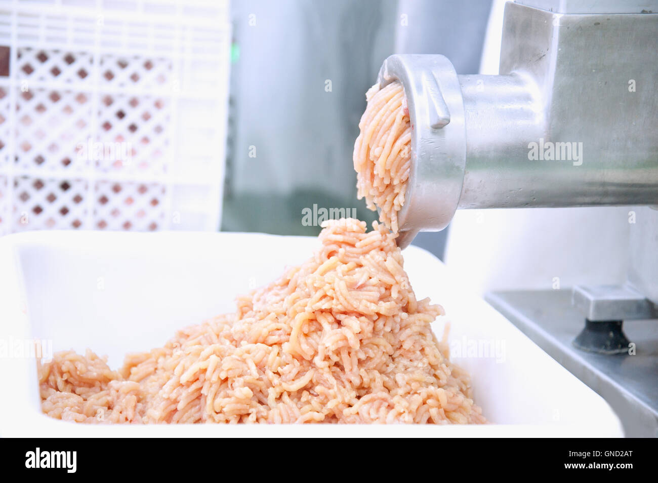 Mincer machine and fresh chopped meat Stock Photo - Alamy