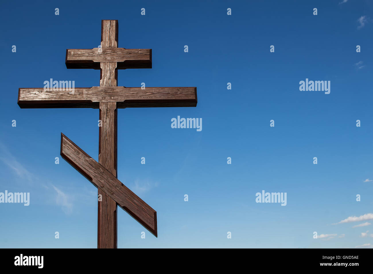 Wooden Symbol Double Cross Blue Sky In The Background Several Small Wooden Symbol Double Cross Blue Sky In The Background Several Small