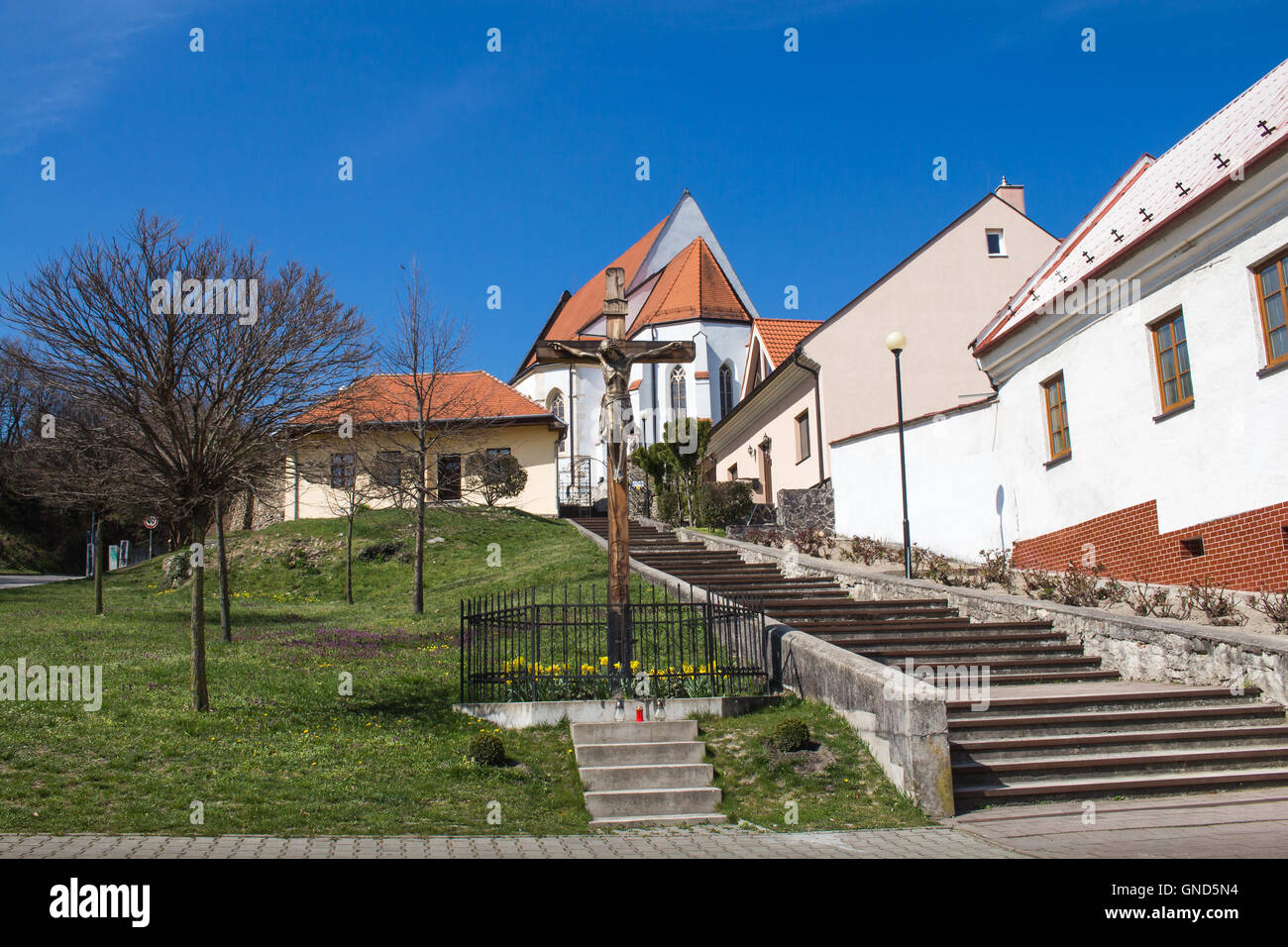 Traditional slovak village, built on a hill, with a church on the top ...