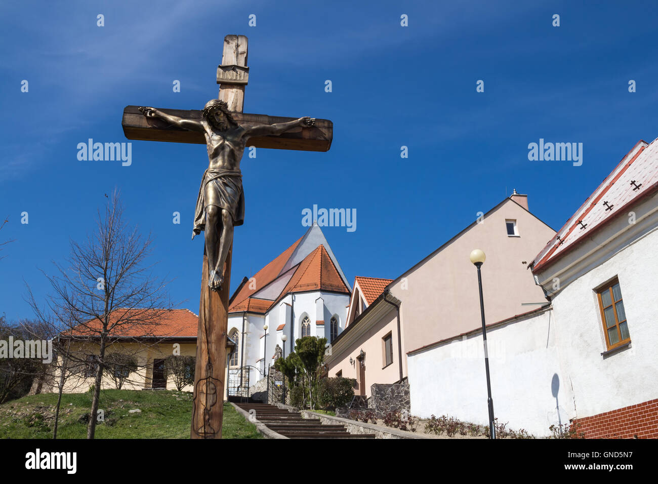 Traditional slovak village, built on a hill, with a church on the top ...