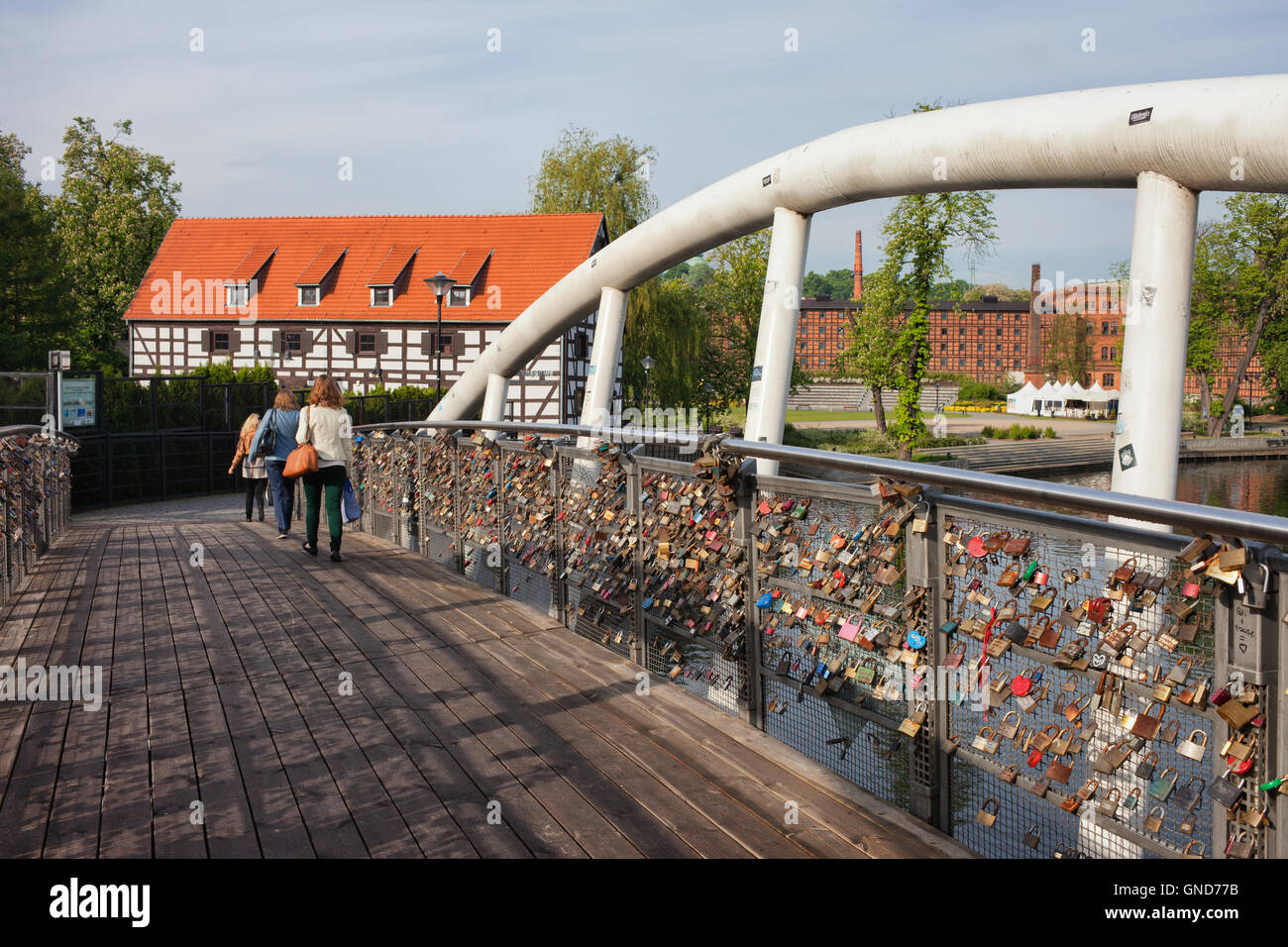 Love locks bridge and White Granary in city of Bydgoszcz, Poland, Jana ...