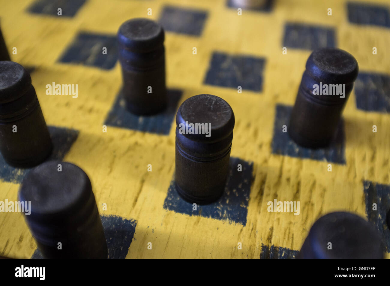 Rugged old dirty antique checkers board and pieces Stock Photo - Alamy