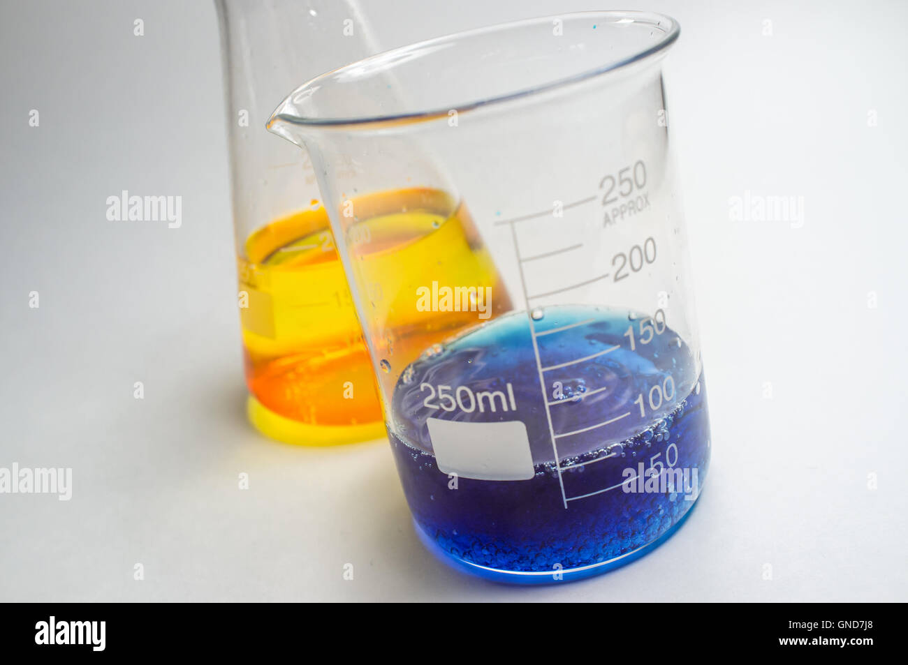 Close up glass measuring beaker for science experiment background Stock ...