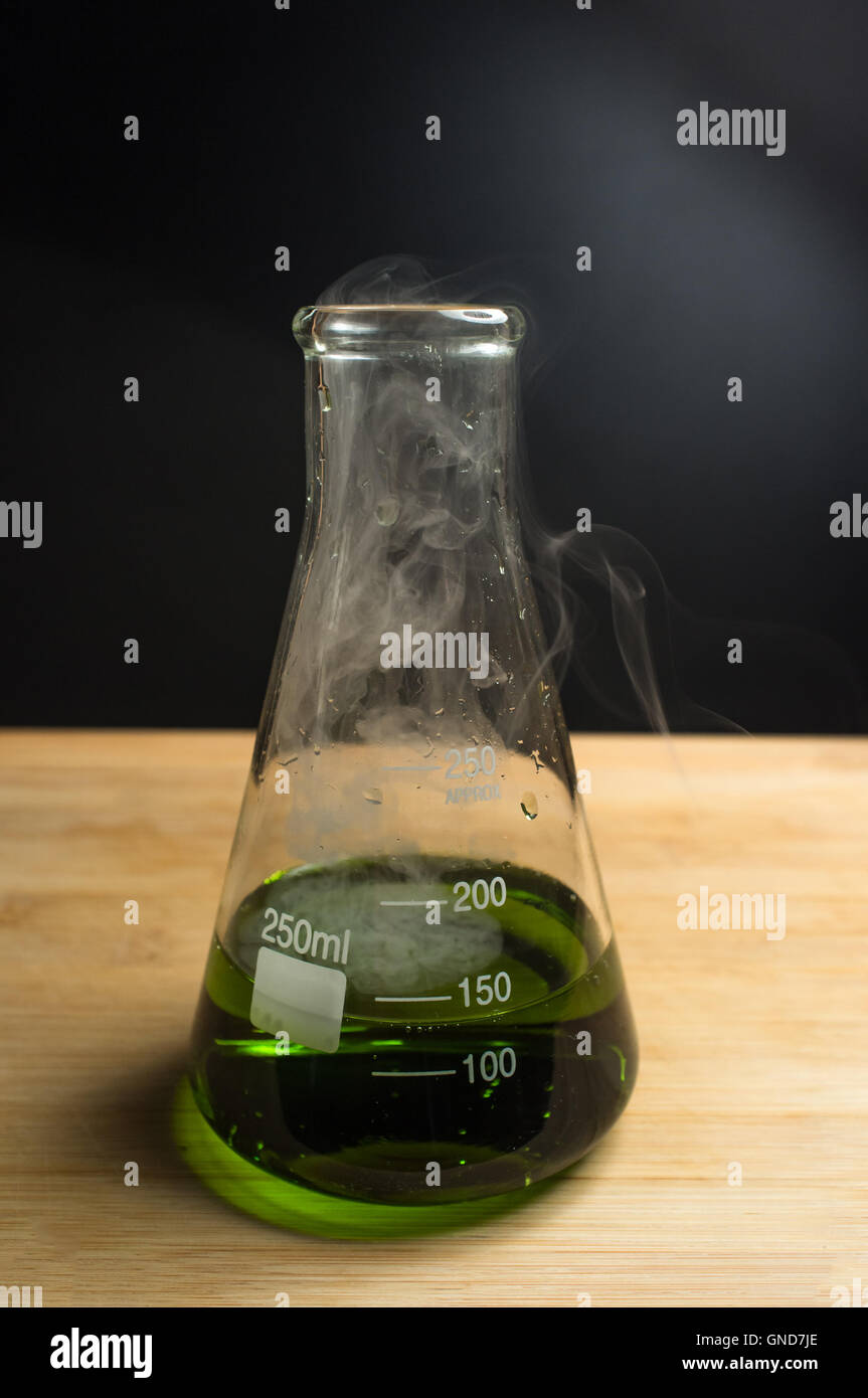 Close up glass measuring beaker for science experiment background Stock ...