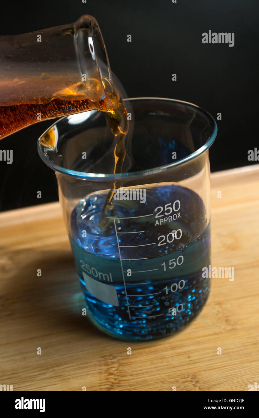 Close up glass measuring beaker for science experiment background Stock ...