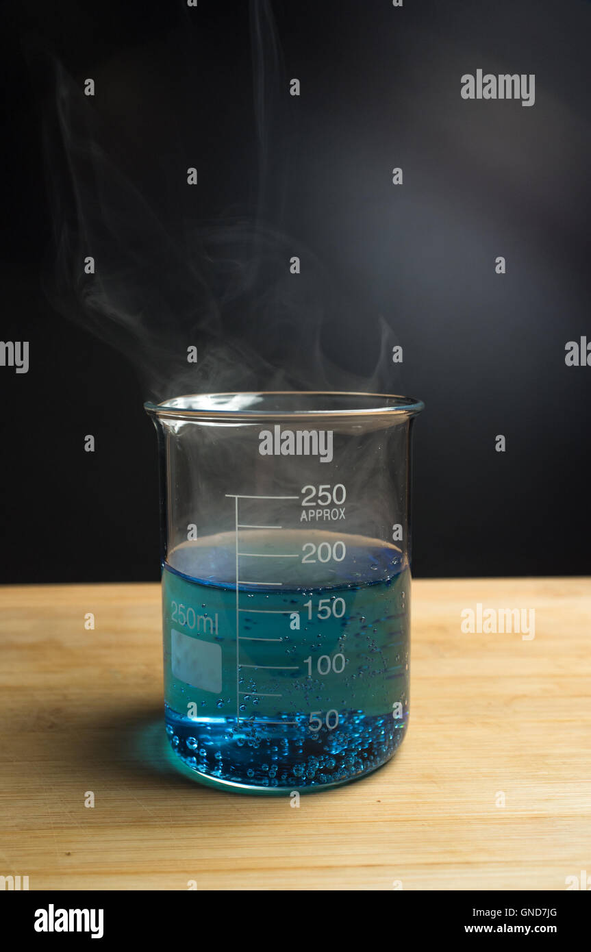 Close up glass measuring beaker for science experiment background Stock ...