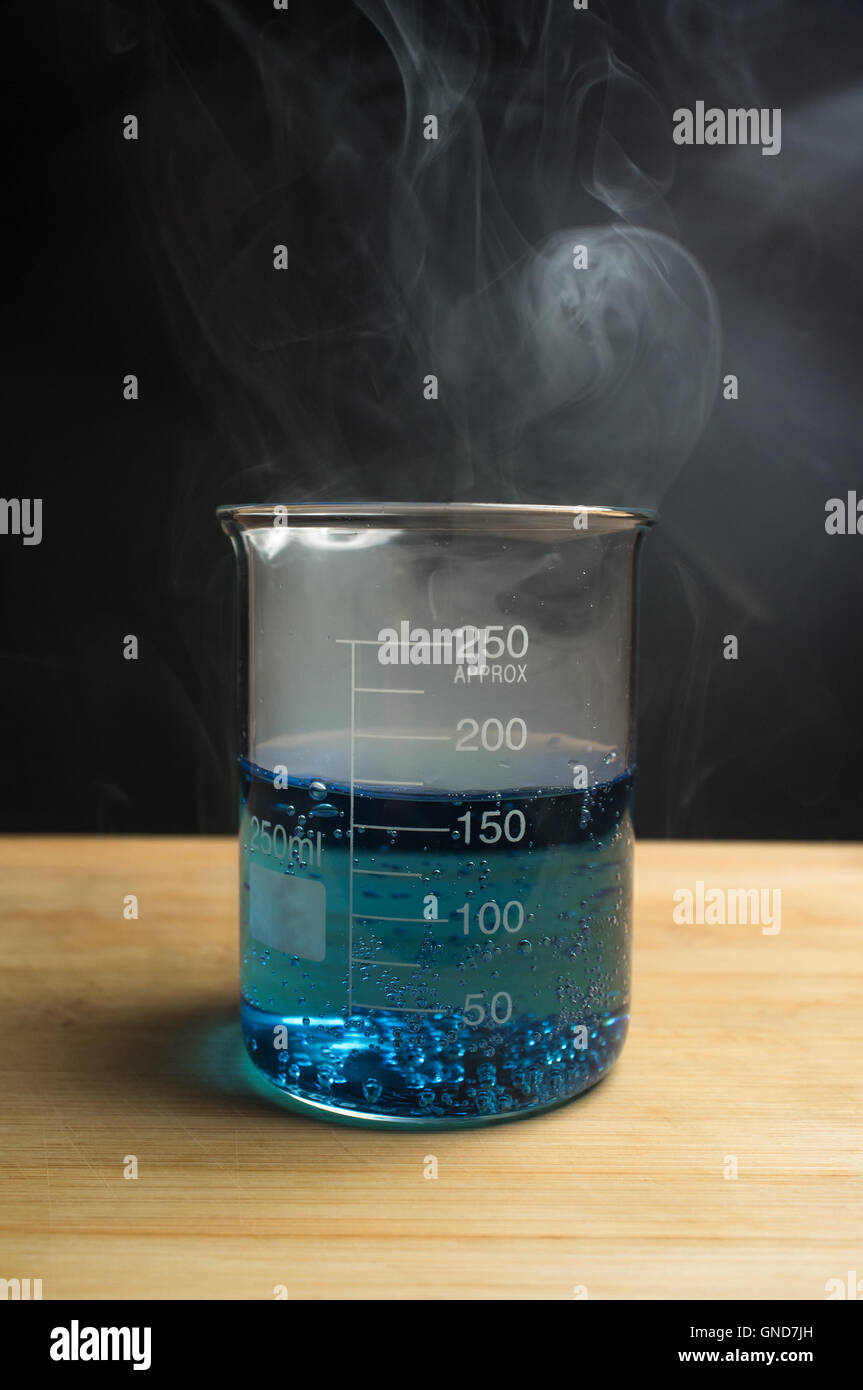 Close up glass measuring beaker for science experiment background Stock ...