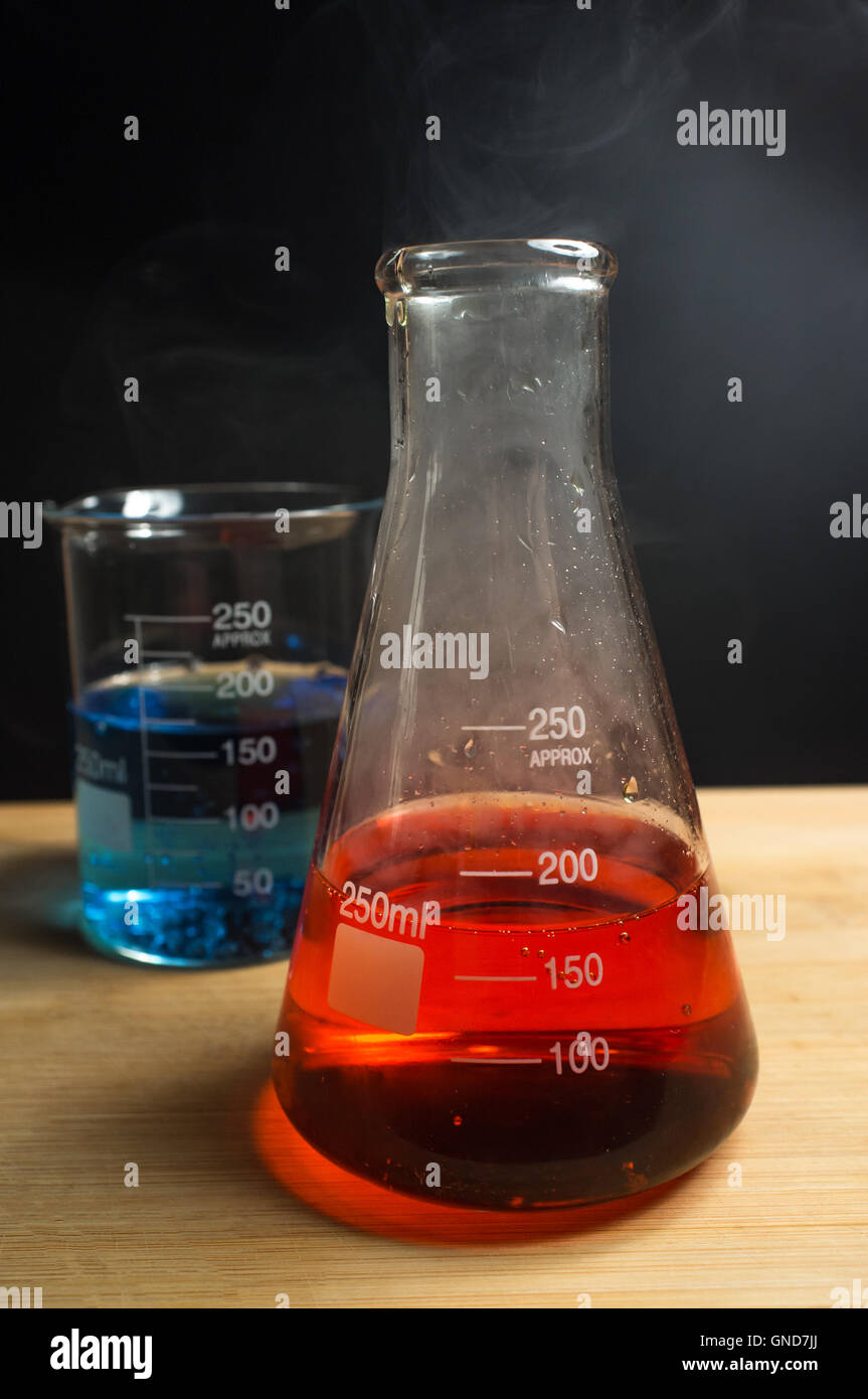 Close up glass measuring beaker for science experiment background Stock ...