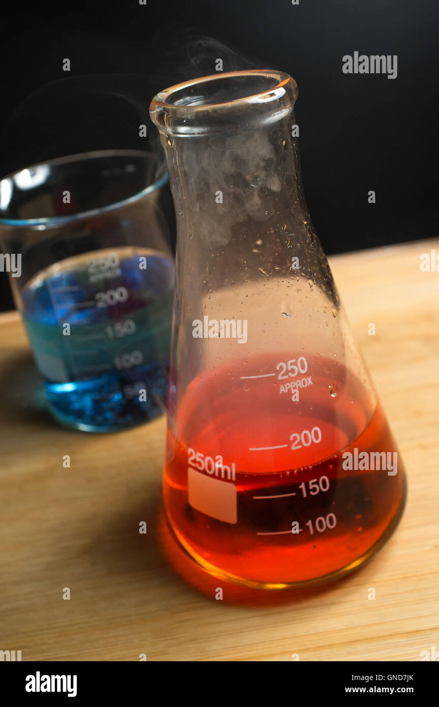 Close up glass measuring beaker for science experiment background Stock ...
