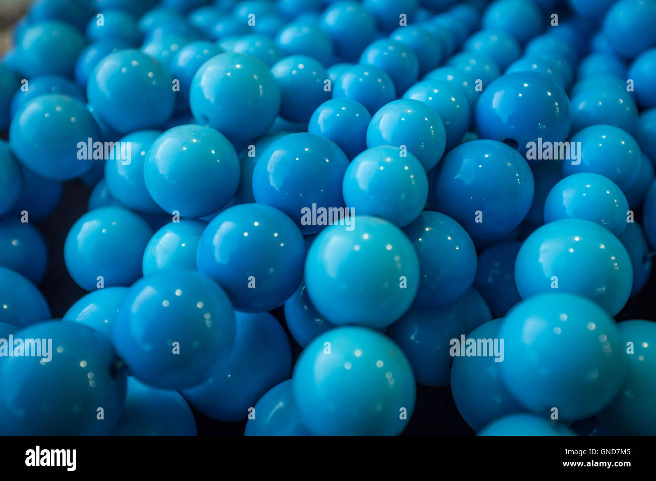 Background of fake blue pearl necklaces for fashion imagery Stock Photo ...