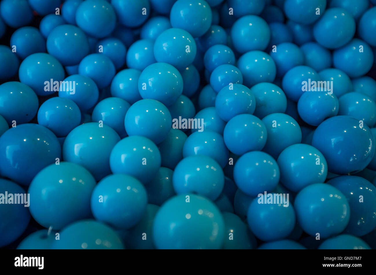 Background of fake blue pearl necklaces for fashion imagery Stock Photo ...