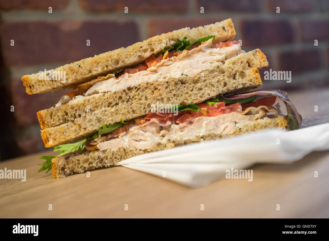 Chicken bacon lettuce and tomato sandwich on whole wheat rye bread ...
