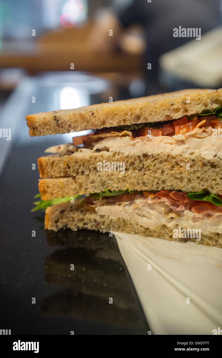 Chicken bacon lettuce and tomato sandwich on whole wheat rye bread ...