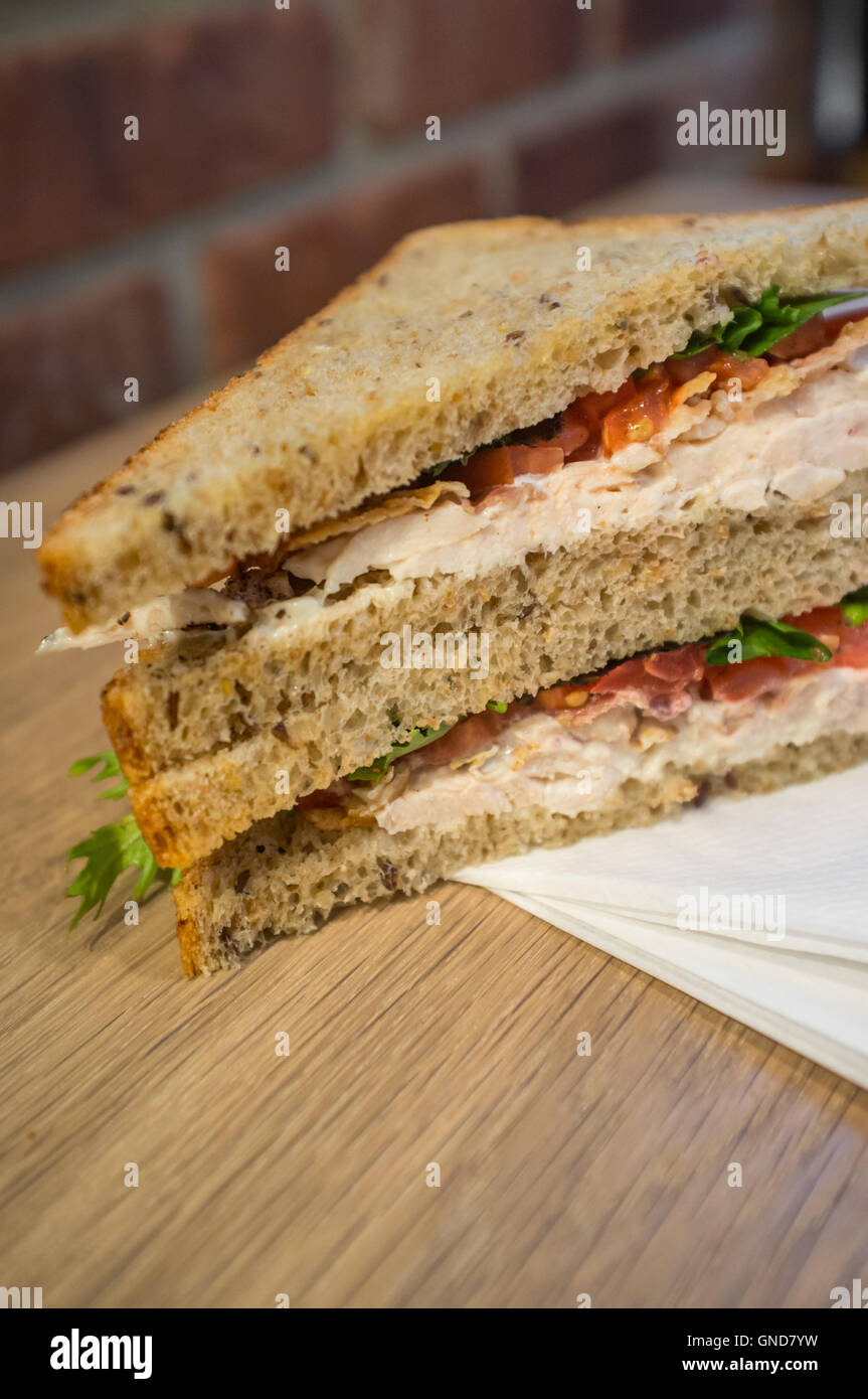 Chicken bacon lettuce and tomato sandwich on whole wheat rye bread ...