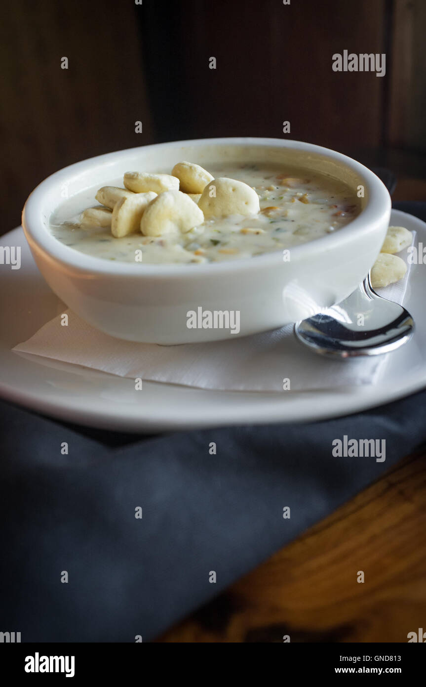 Creamy New England Clam Chowder garnished with oyster crackers Stock ...