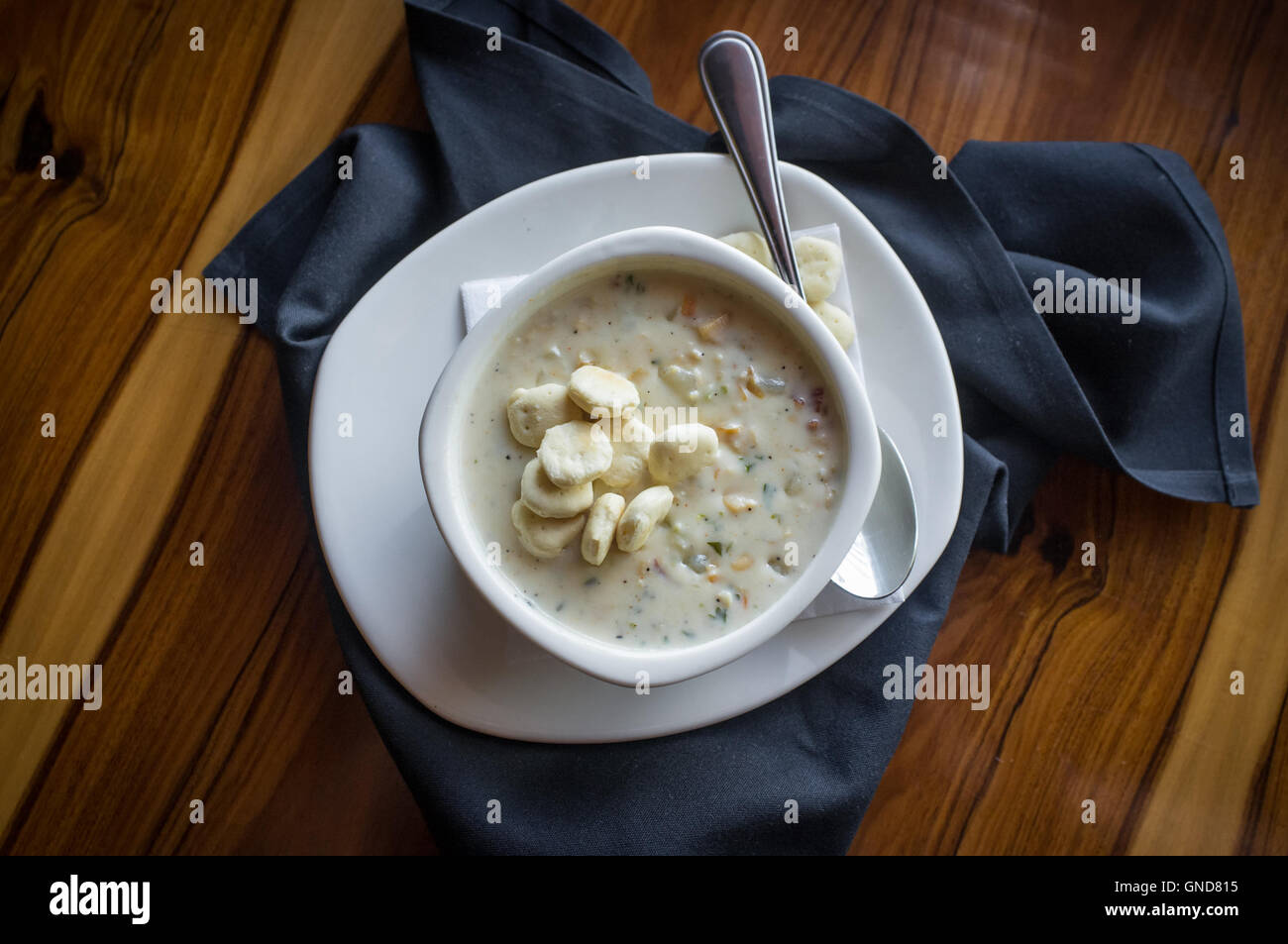 Creamy New England Clam Chowder garnished with oyster crackers Stock ...
