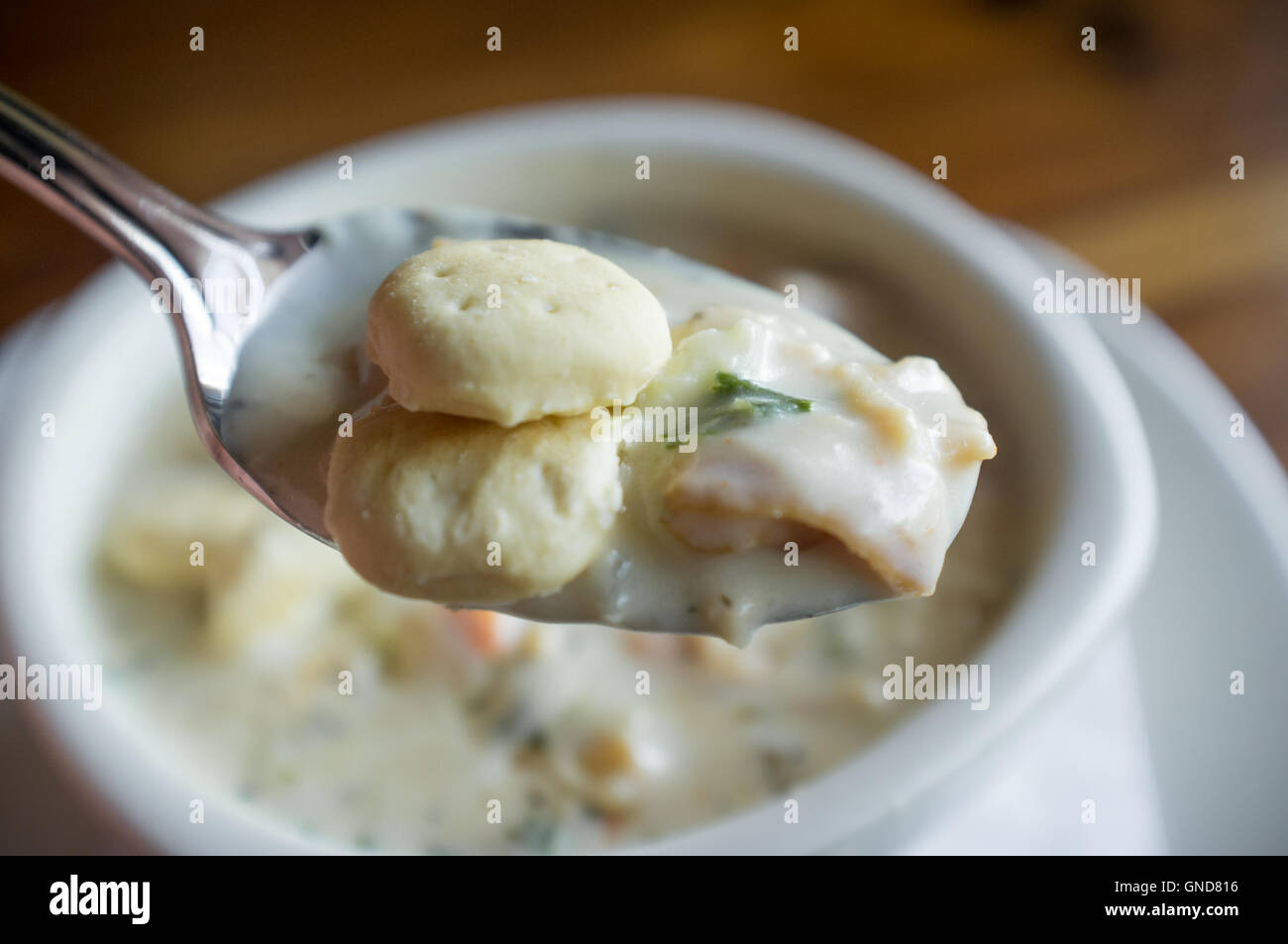 Creamy New England Clam Chowder garnished with oyster crackers Stock ...