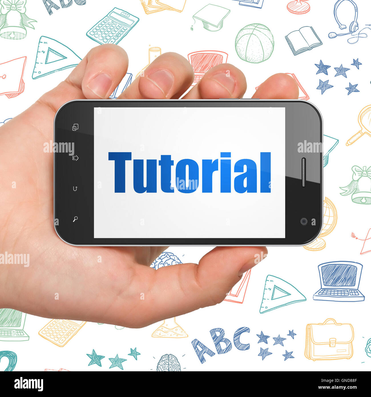 Studying concept: Hand Holding Smartphone with Tutorial on display ...