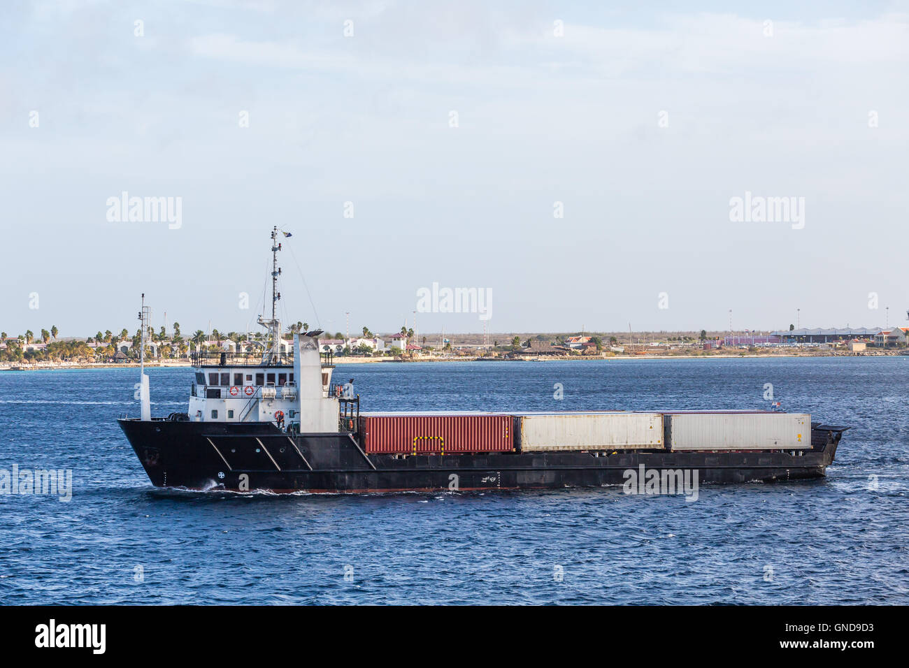 Small Freighter in Blue Channel Stock Photo - Alamy