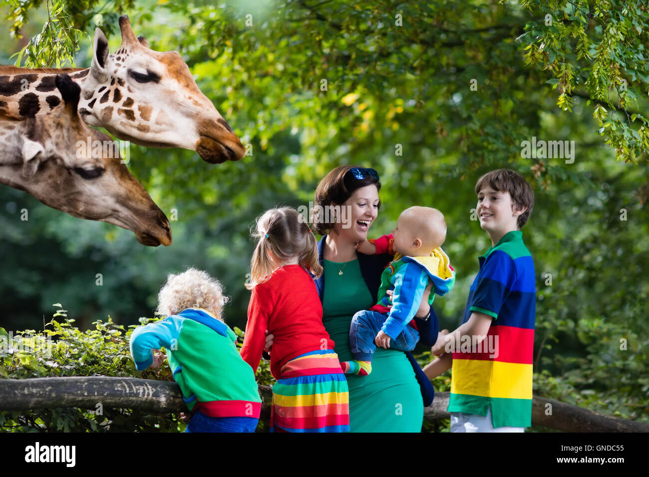 Mother and children, school student, little toddler boy, preschool girl ...