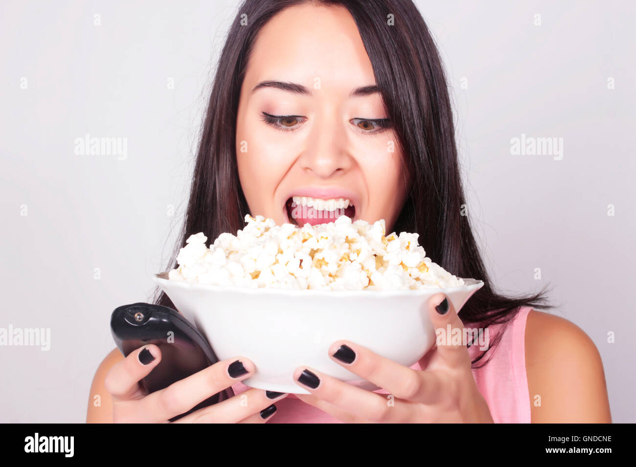 Remote control snack hi-res stock photography and images - Alamy