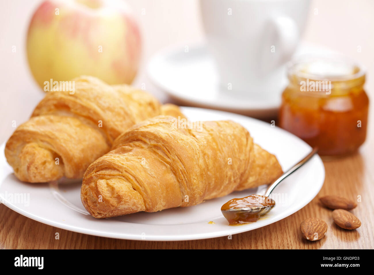 croissant with jam for breakfast Stock Photo - Alamy