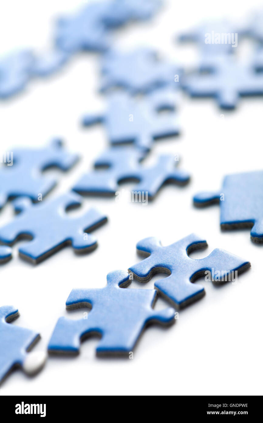blue puzzle pieces isolated Stock Photo - Alamy