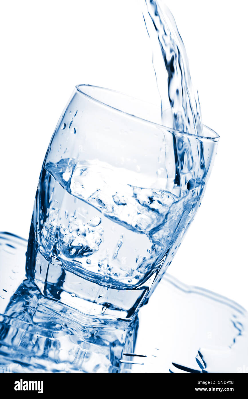 water splashing into glass isolated Stock Photo - Alamy