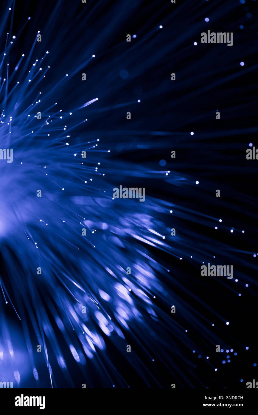 abstract blue fiber optic over black background Stock Photo - Alamy
