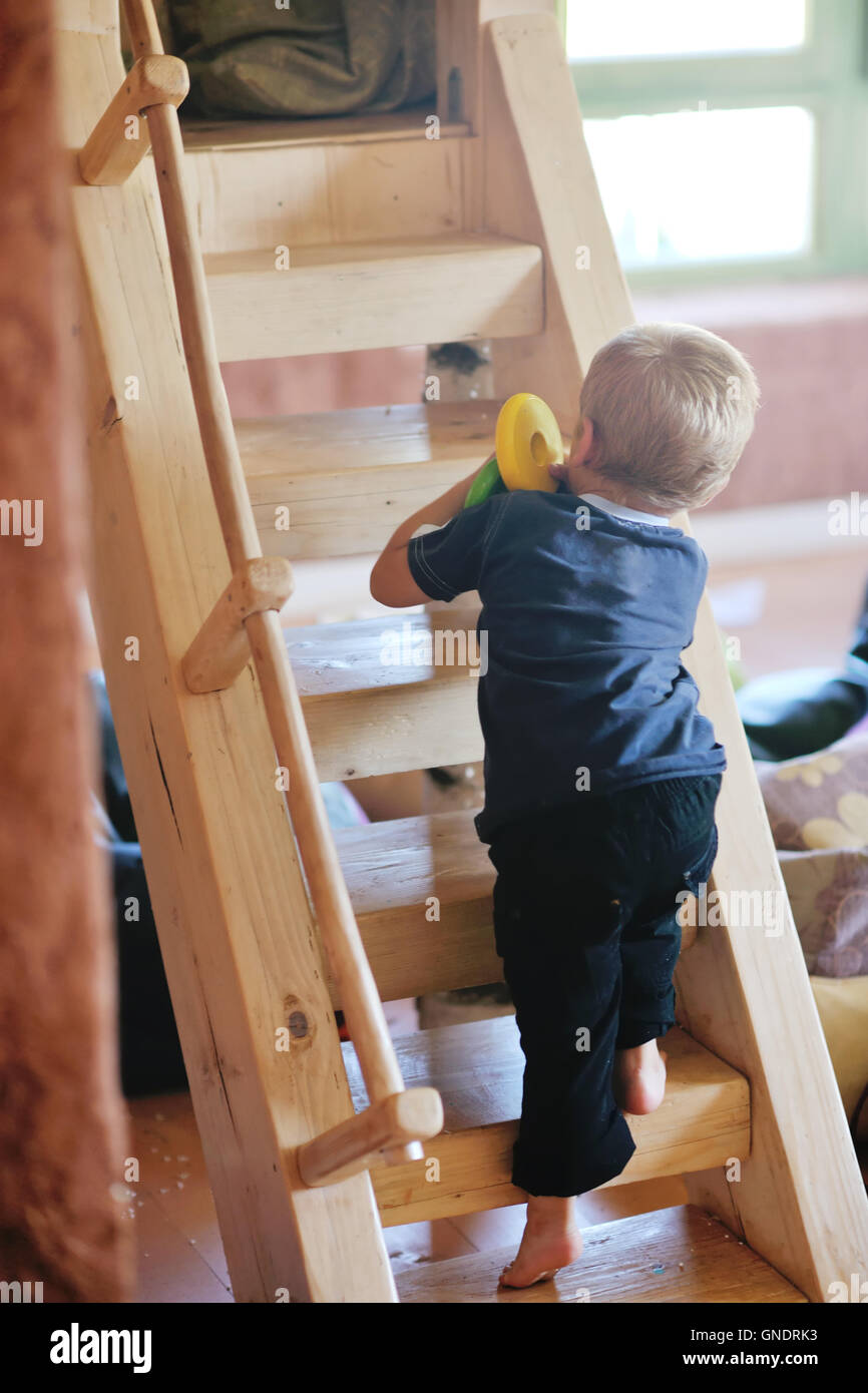 beautiful young child making first steps Stock Photo - Alamy