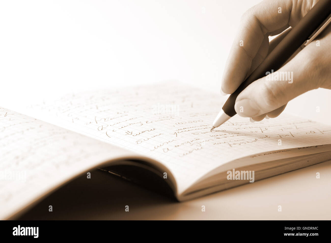 hand writing in notebook Stock Photo - Alamy