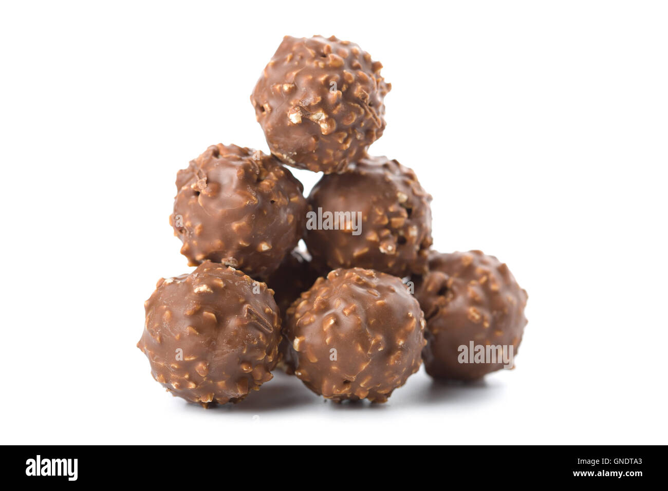 round chocolate candies isolated Stock Photo - Alamy