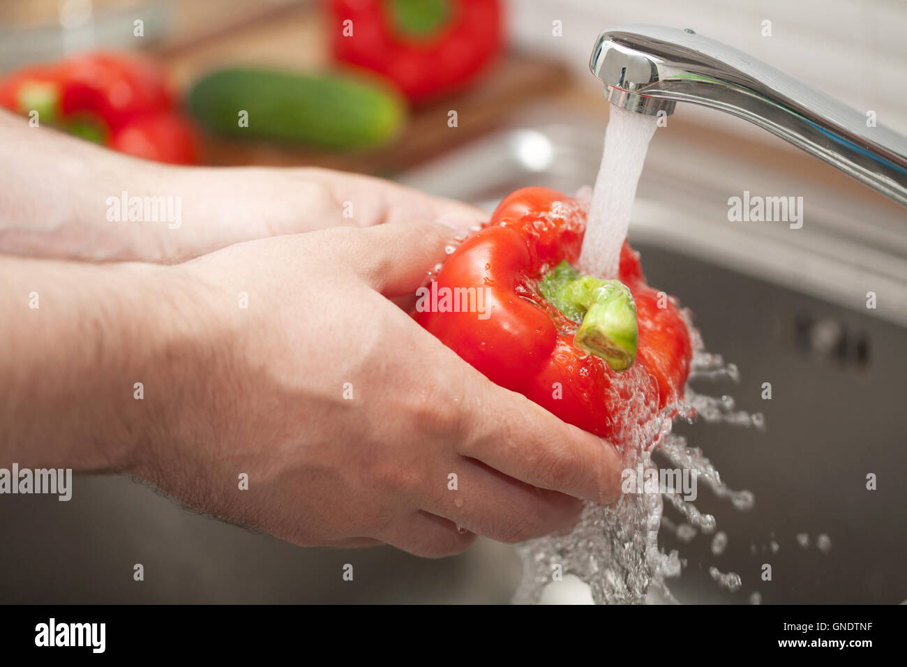 man washing vegetable Stock Photo - Alamy