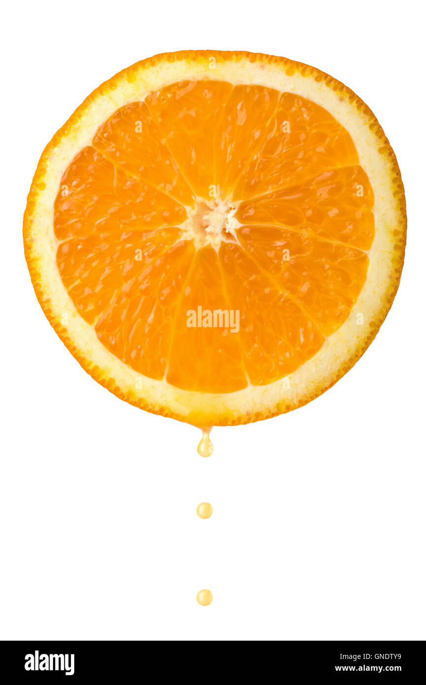 drop of juice falling from orange half isolated Stock Photo - Alamy