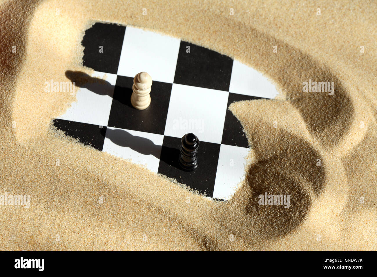Chess In Sand Stock Photo - Alamy