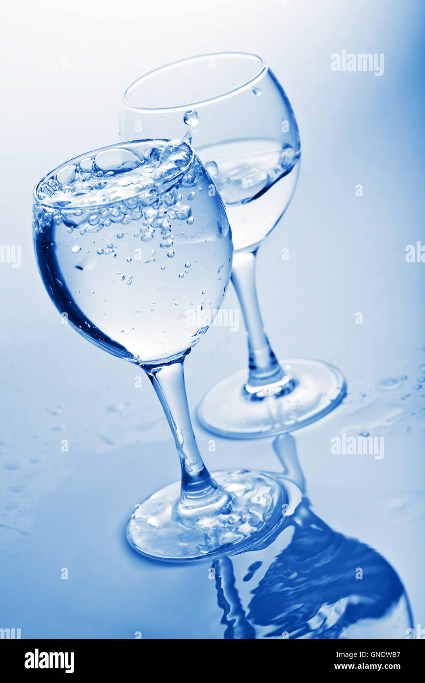 water splashing into glass Stock Photo - Alamy