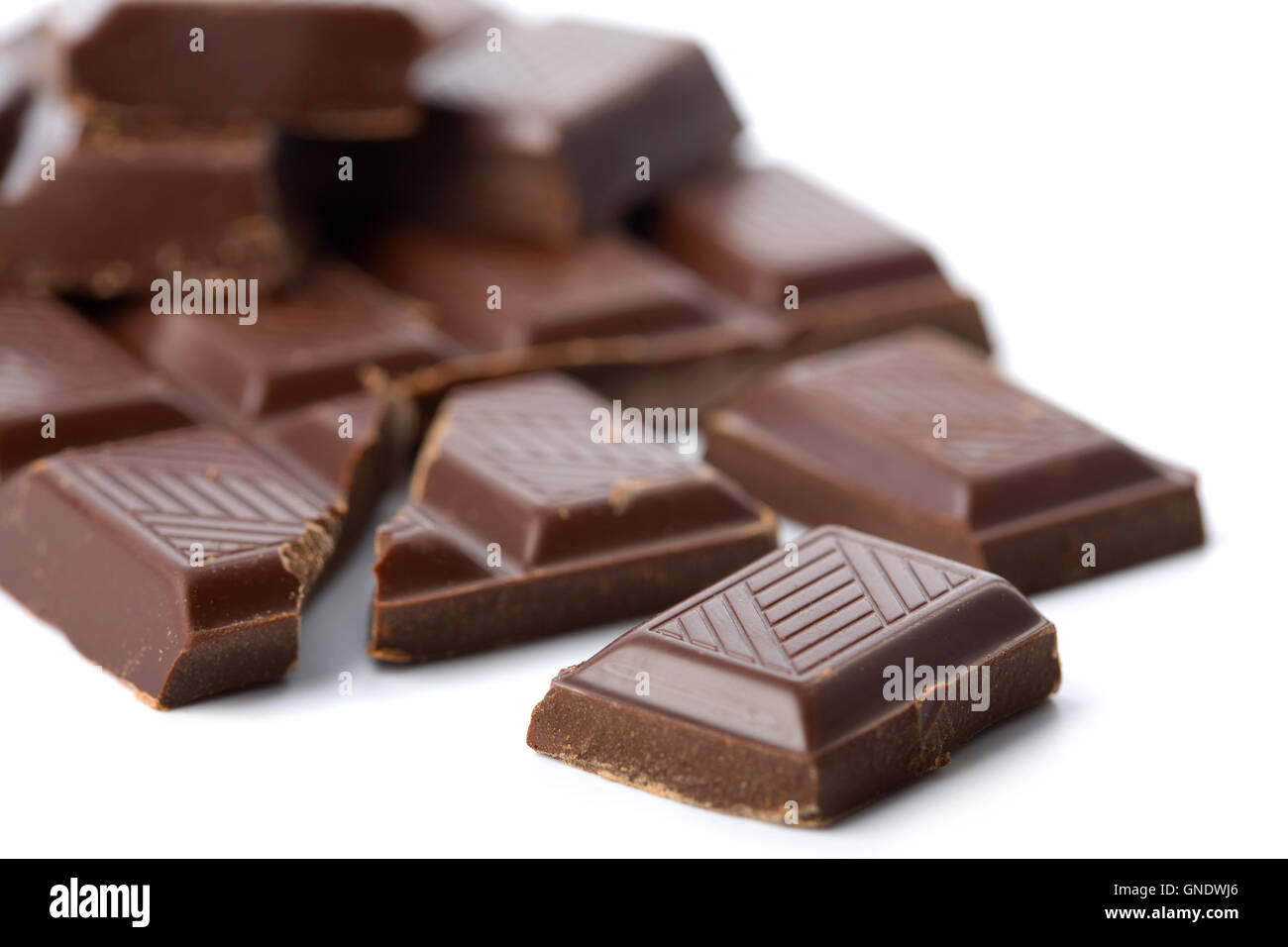 broken pieces of chocolate isolated Stock Photo - Alamy