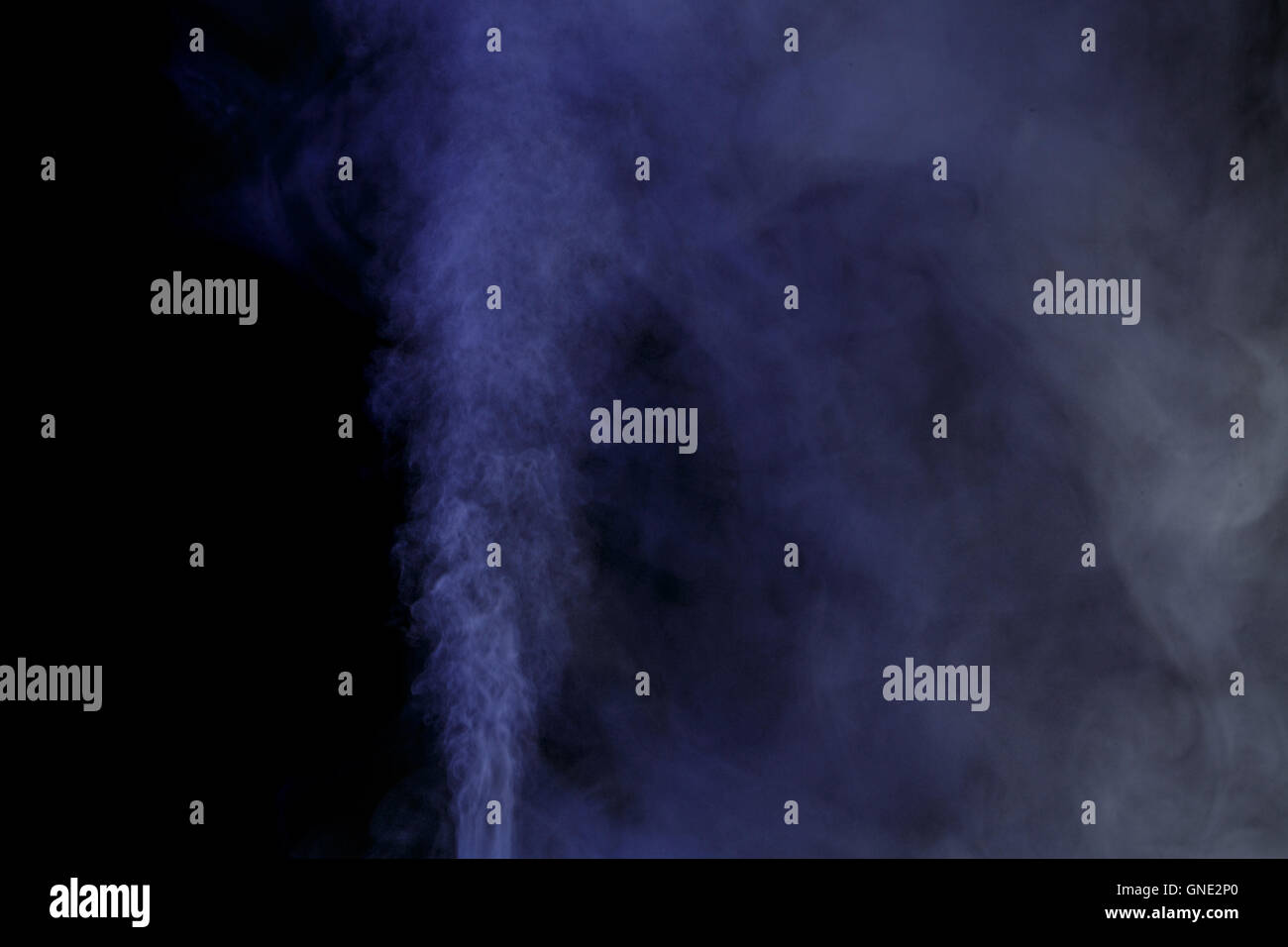 Abstract blue water vapor on a black background. Texture. Design ...