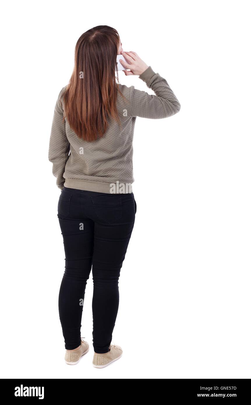 back view of a woman talking on the phone Stock Photo - Alamy