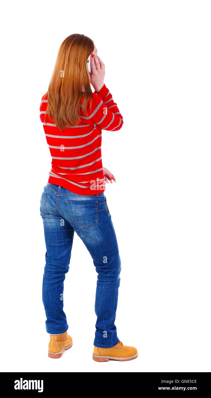 back view of a woman talking on the phone Stock Photo - Alamy
