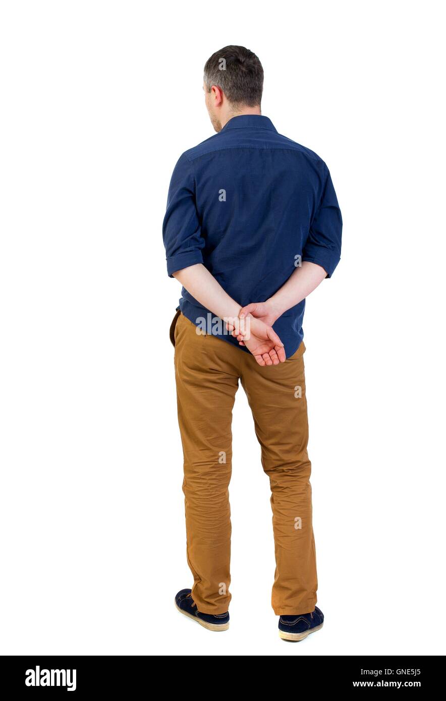 Back view of man . Standing young guy Stock Photo - Alamy