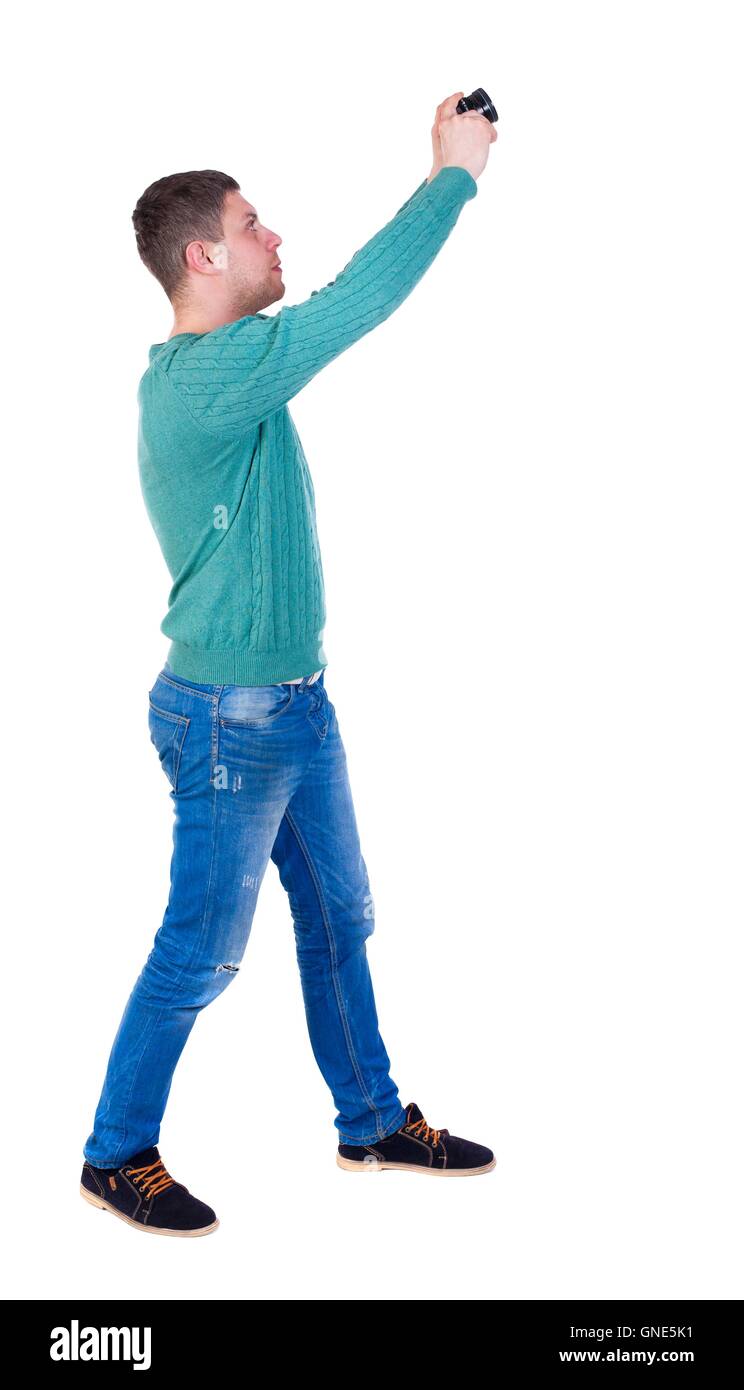 Back view of man photographing Stock Photo - Alamy