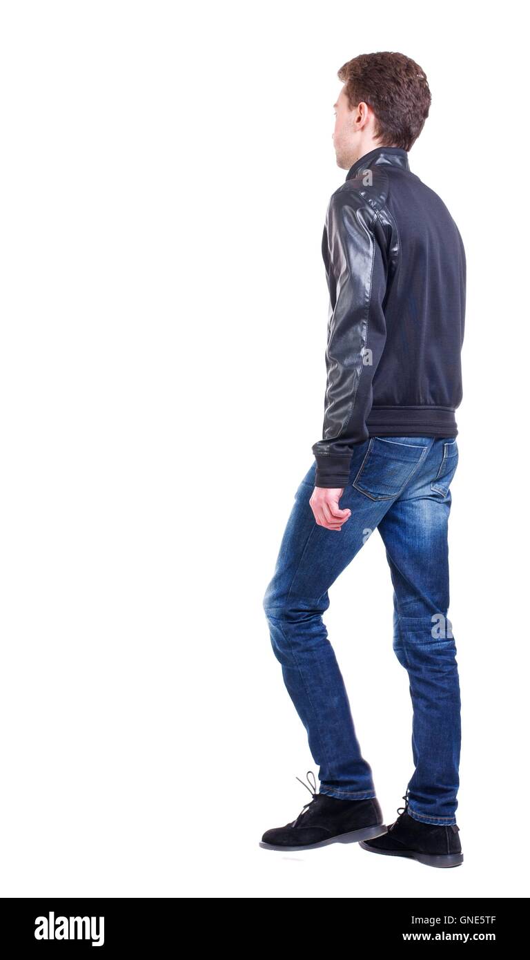 Back view of going handsome man Stock Photo - Alamy