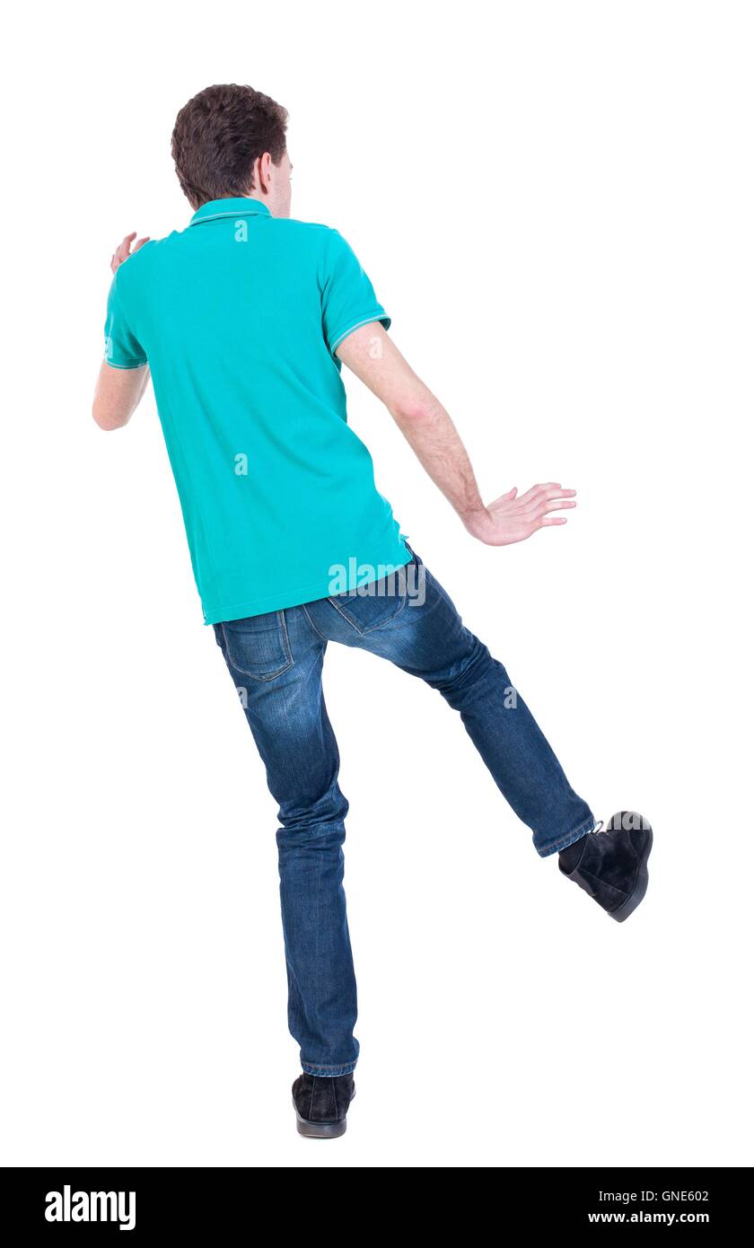 back view of dancing young man Stock Photo - Alamy