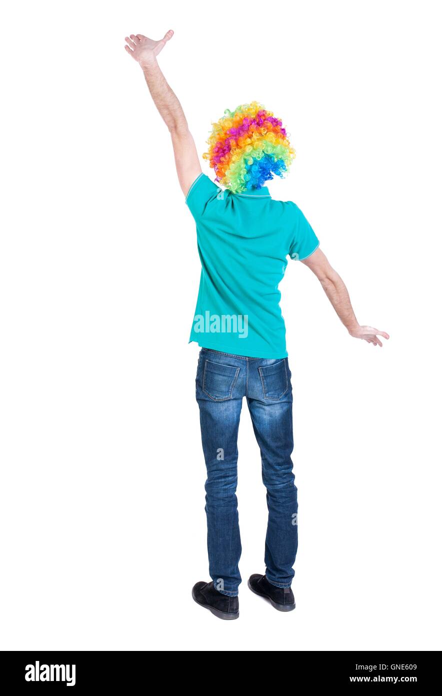 back view of dancing young beautiful man in clown wig Stock Photo - Alamy