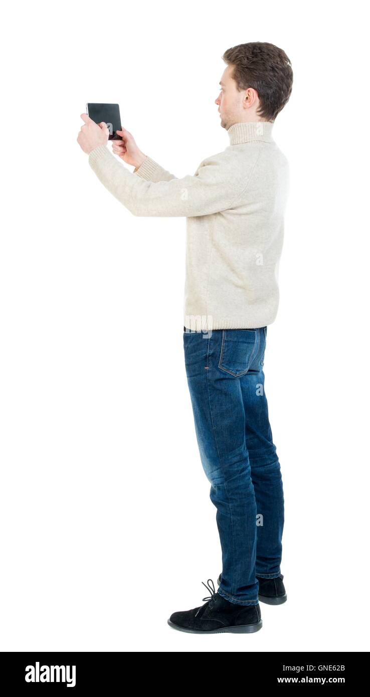 back view of standing business man photographing a phone or tabl Stock ...