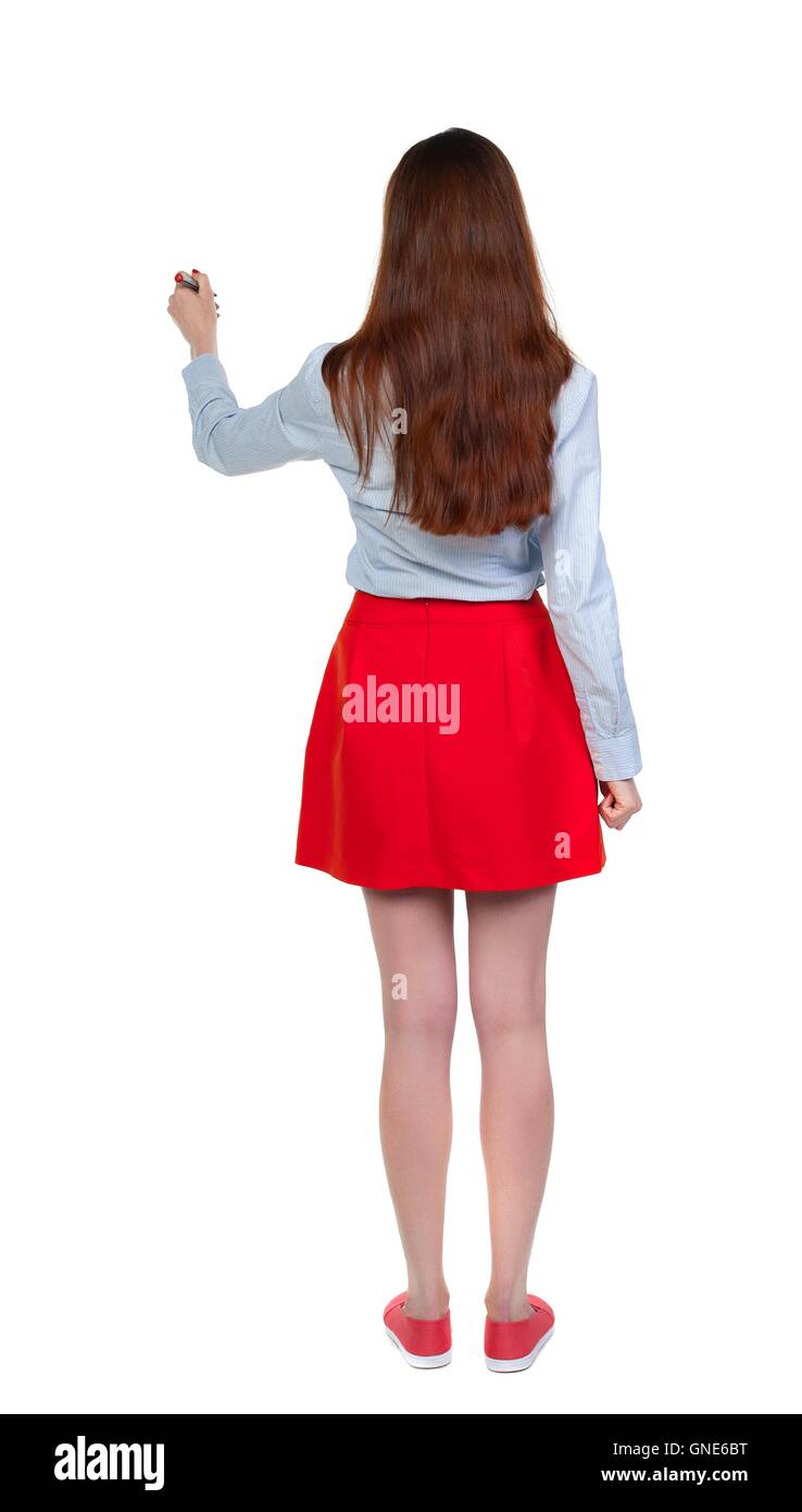 back view of writing beautiful woman. Young girl in dress Stock Photo ...