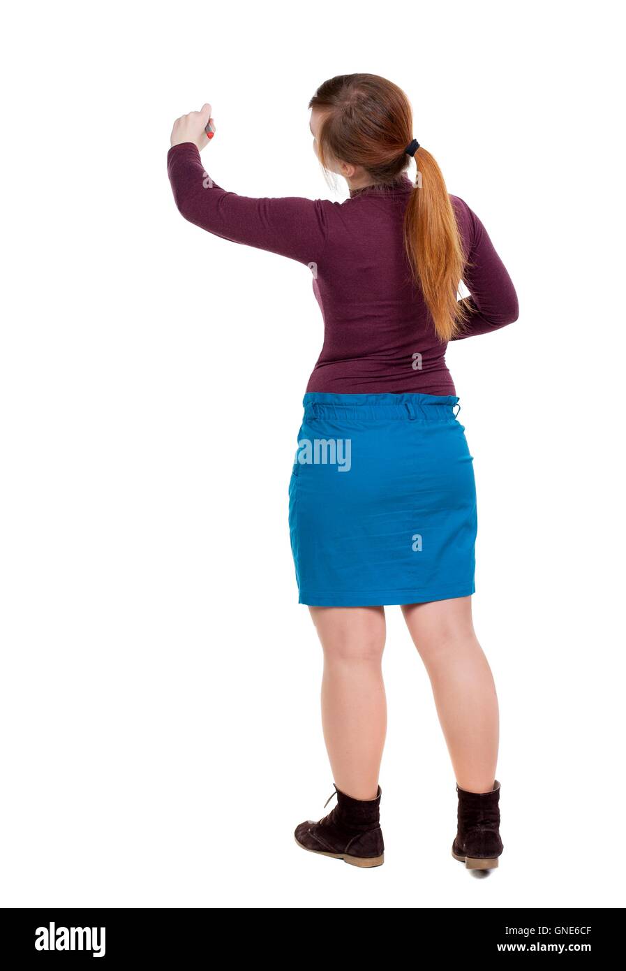 back view of writing beautiful woman. Young girl in dress Stock Photo ...